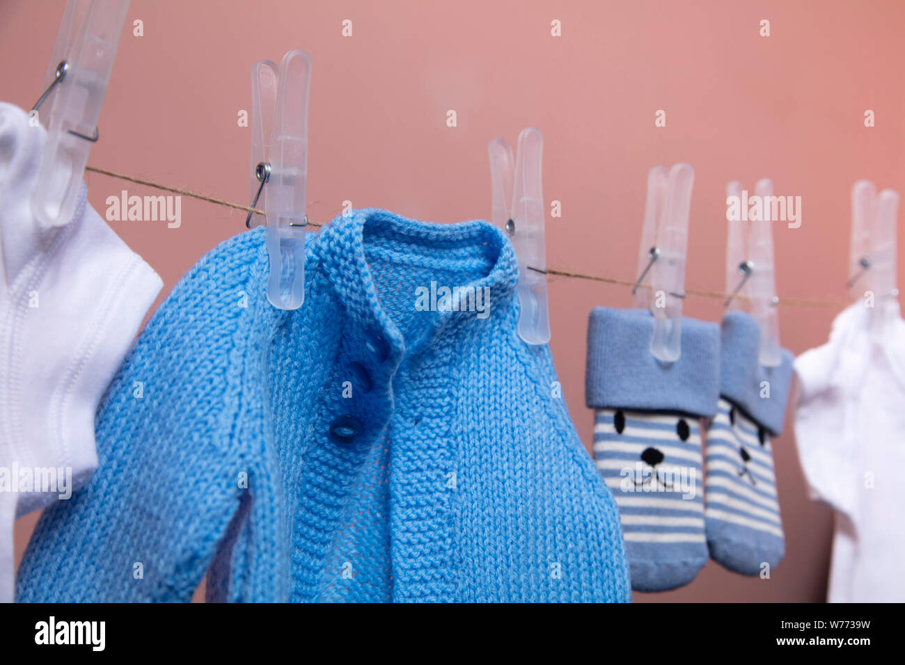 Washing line sweater hi-res stock photography and images - Alamy