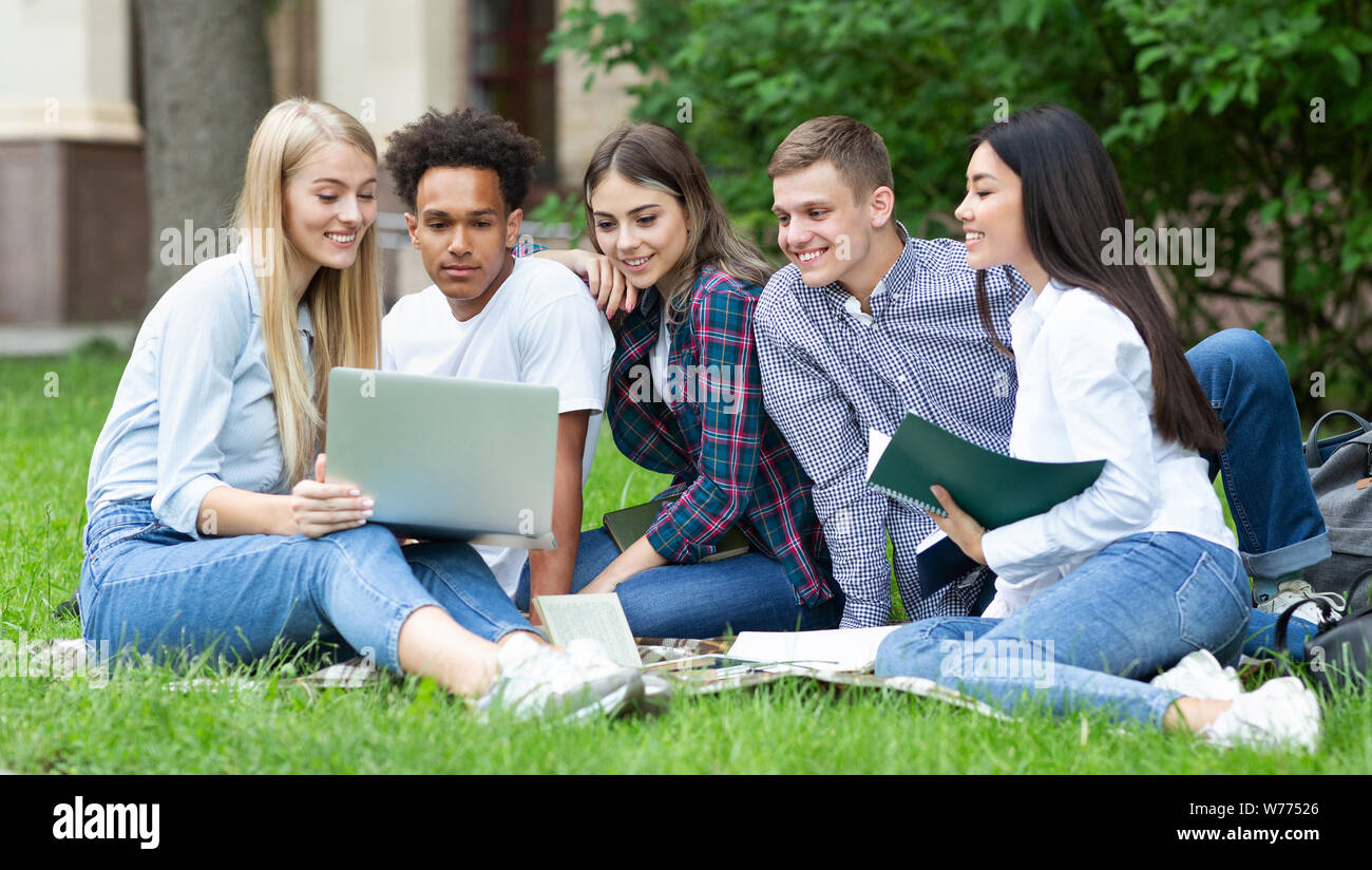 Students studying in group project outdoors in college campus Stock ...