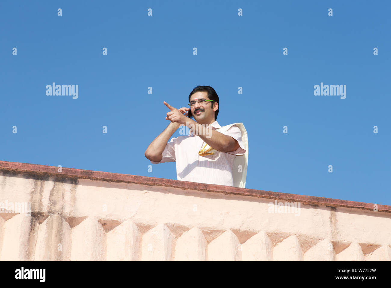 Indian man talking hi-res stock photography and images - Alamy