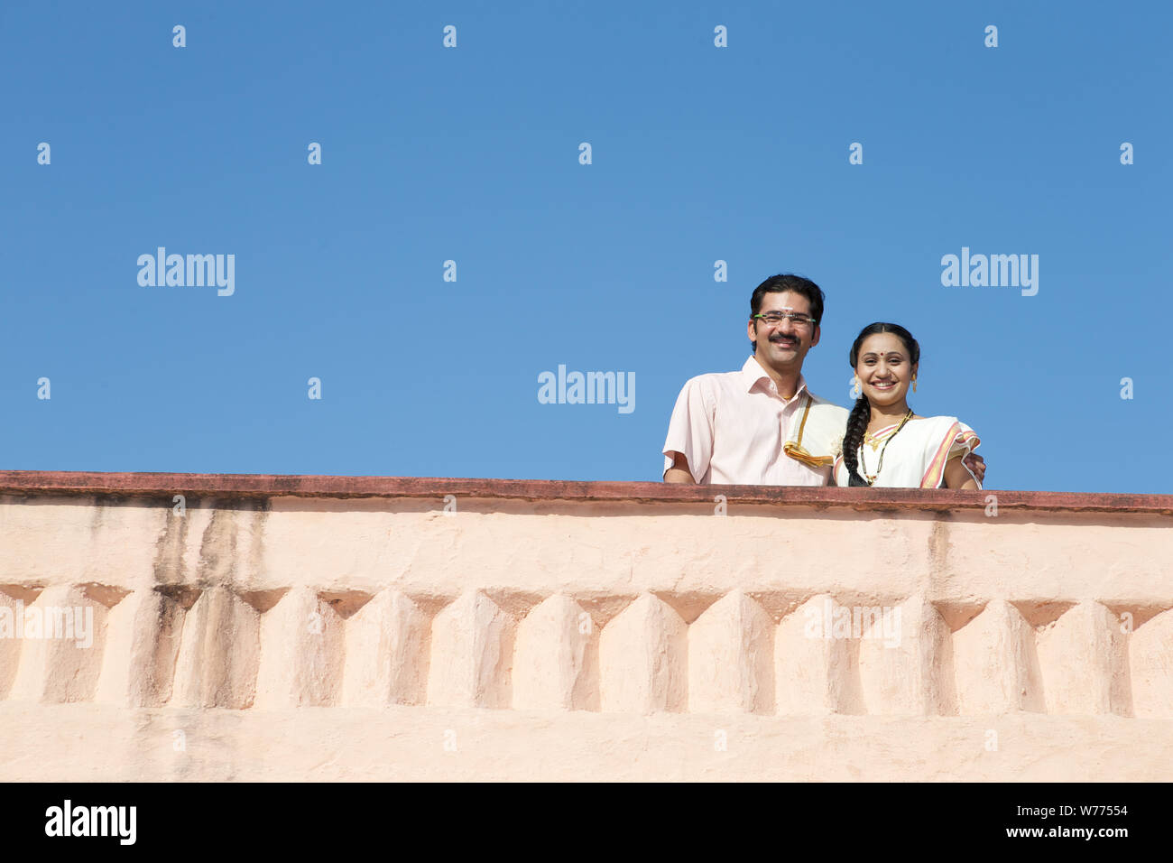 Low angle view of South Indian couple Stock Photo - Alamy