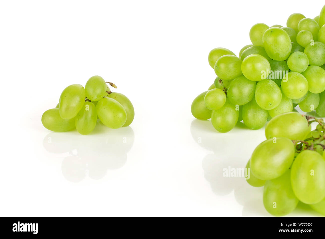 Lot of whole fresh green grape isolated on white background Stock Photo ...