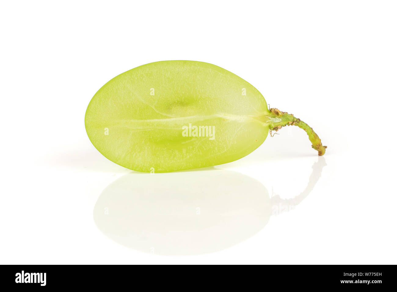 One half of fresh green grape isolated on white background Stock Photo ...