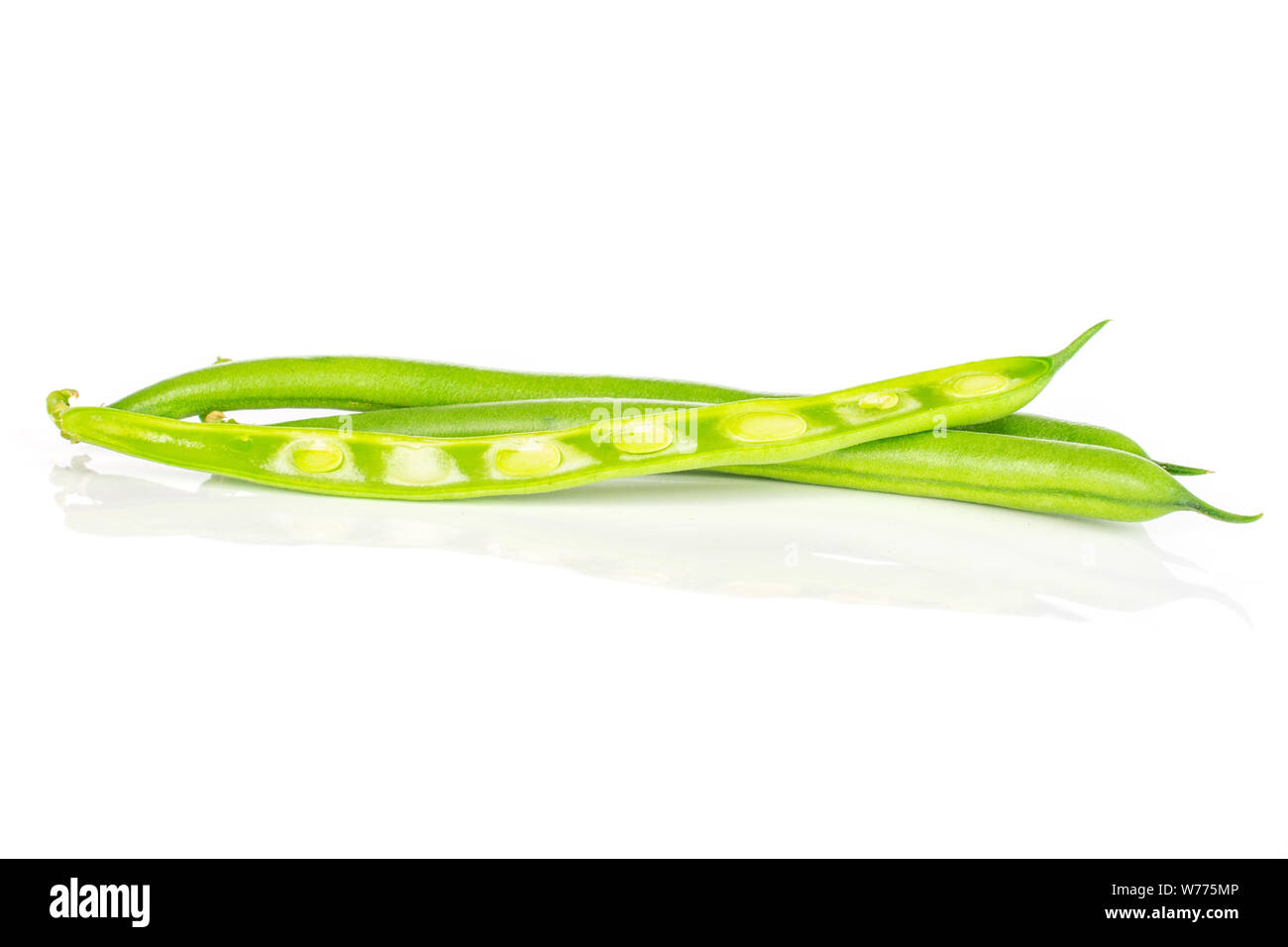 Group of one whole one half of fresh green bean isolated on white ...