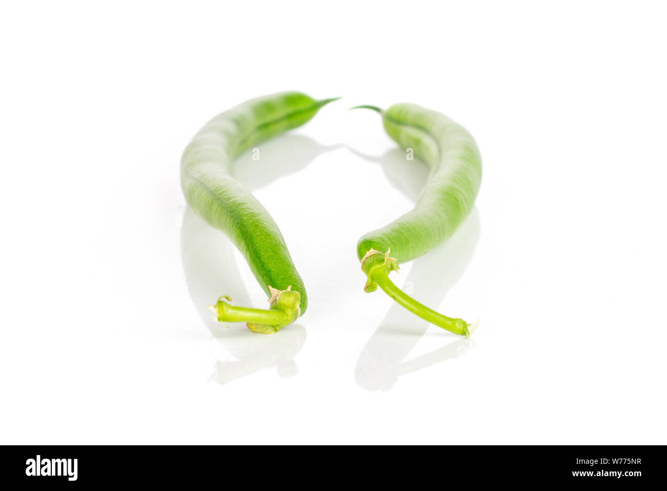 Group of two whole fresh green bean isolated on white background Stock ...