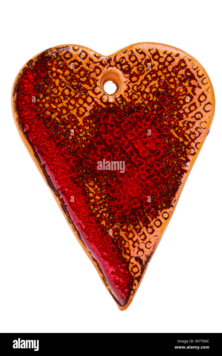 Red handmade ceramic heart isolated on white Stock Photo - Alamy