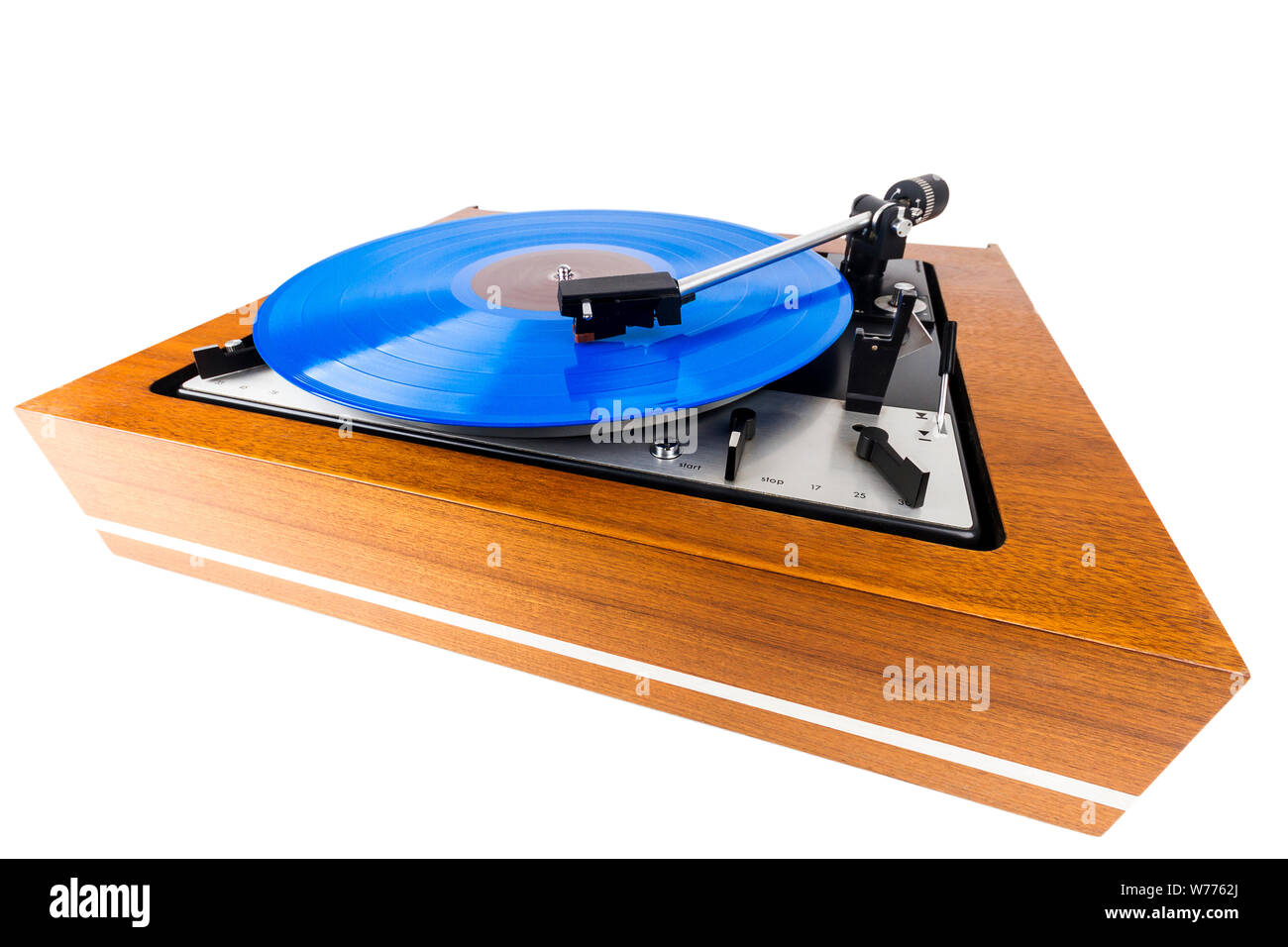 Vintage turntable with a blue vinyl isolated on white. Wooden plinth ...