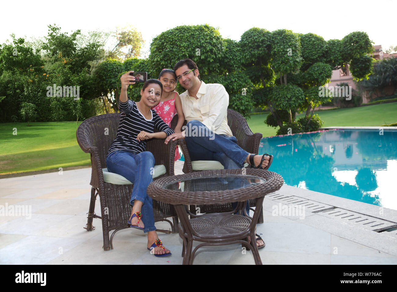 Family pool daughter enjoyment clothing hi-res stock photography and ...