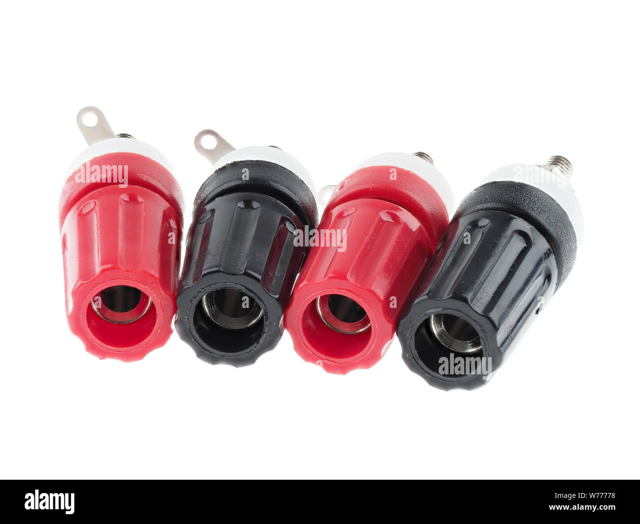 Red and black banana sockets, isolated on white Stock Photo - Alamy