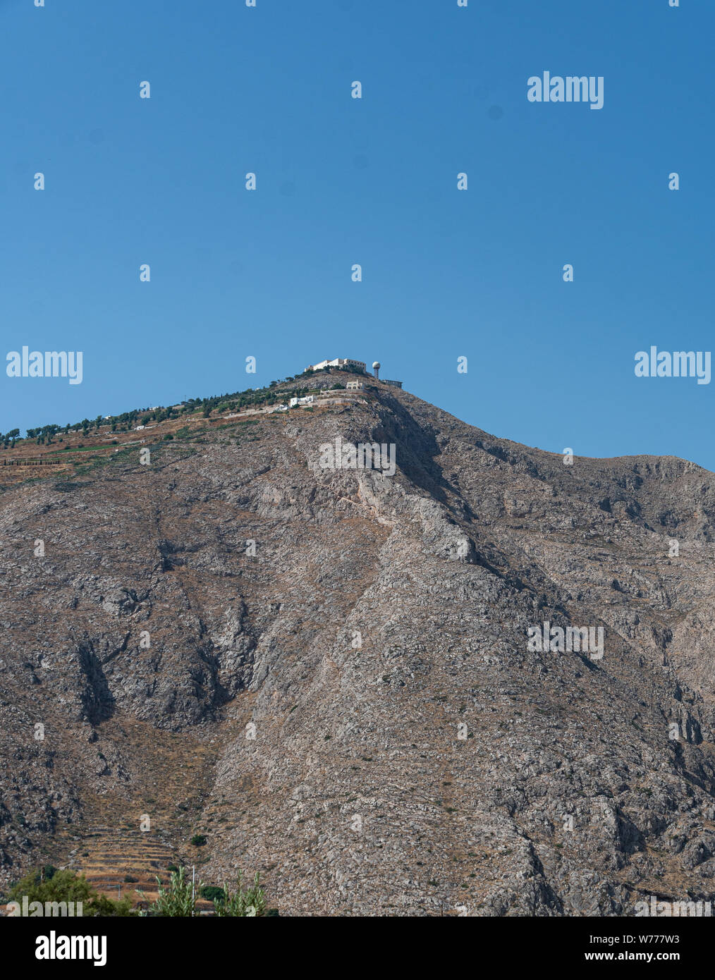 The monastery of Prophet Elias atop Santorini's highest mountain peak ...