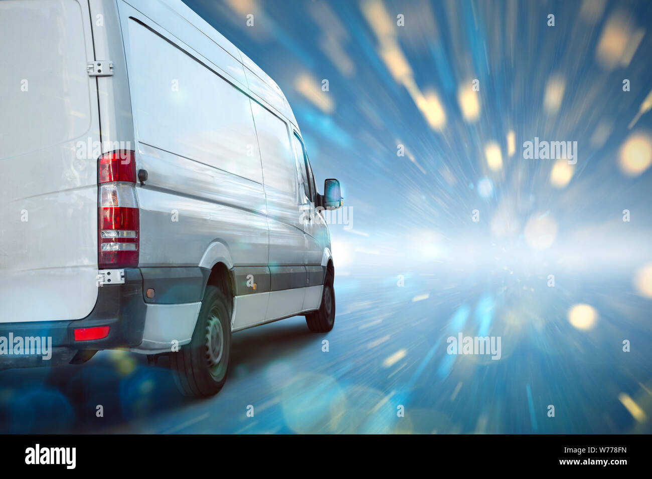 Fast moving delivery van Stock Photo - Alamy