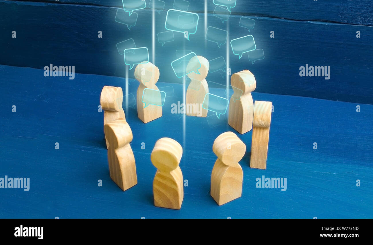 Speech clouds in the center of a people circle. Discussion processes in ...