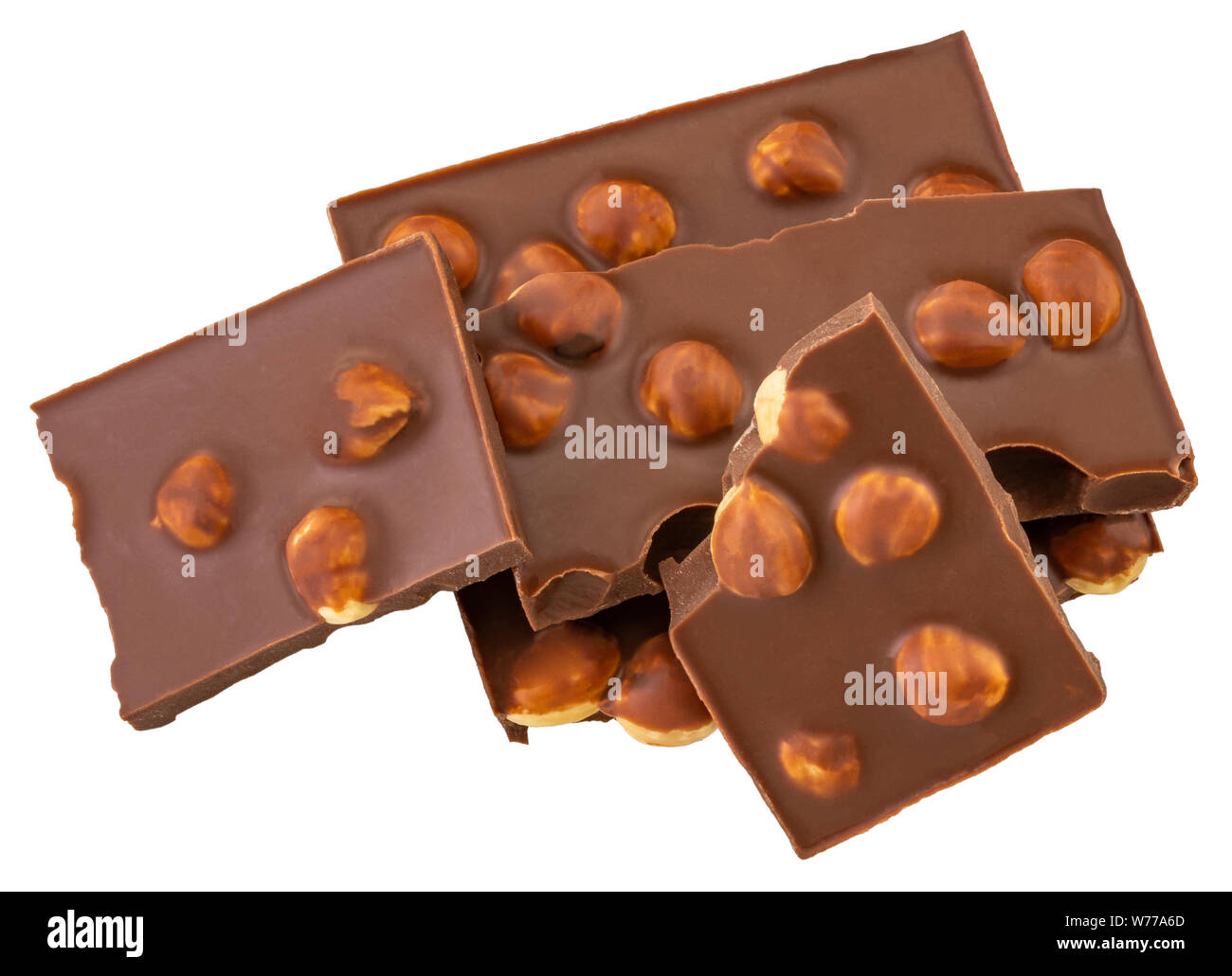 chocolate pieces with nuts isolated on white background Stock Photo - Alamy