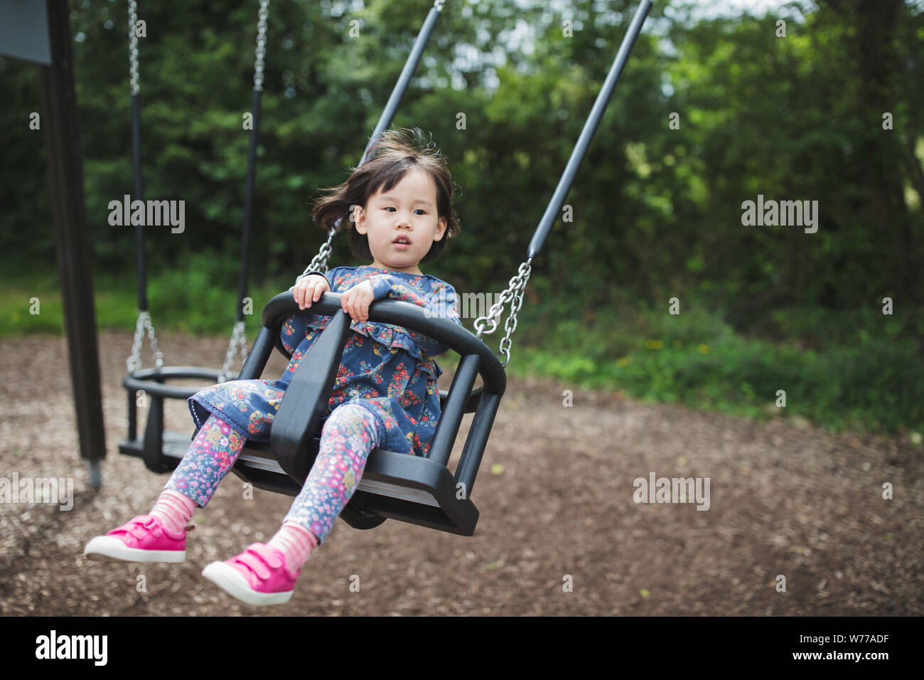 toddler girl play at Spring outdoor playground Stock Photo - Alamy