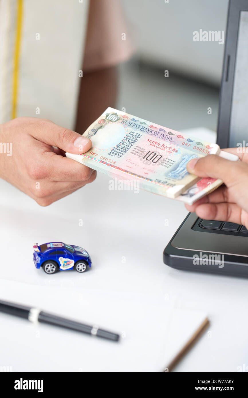Giving money bank teller hi-res stock photography and images - Alamy