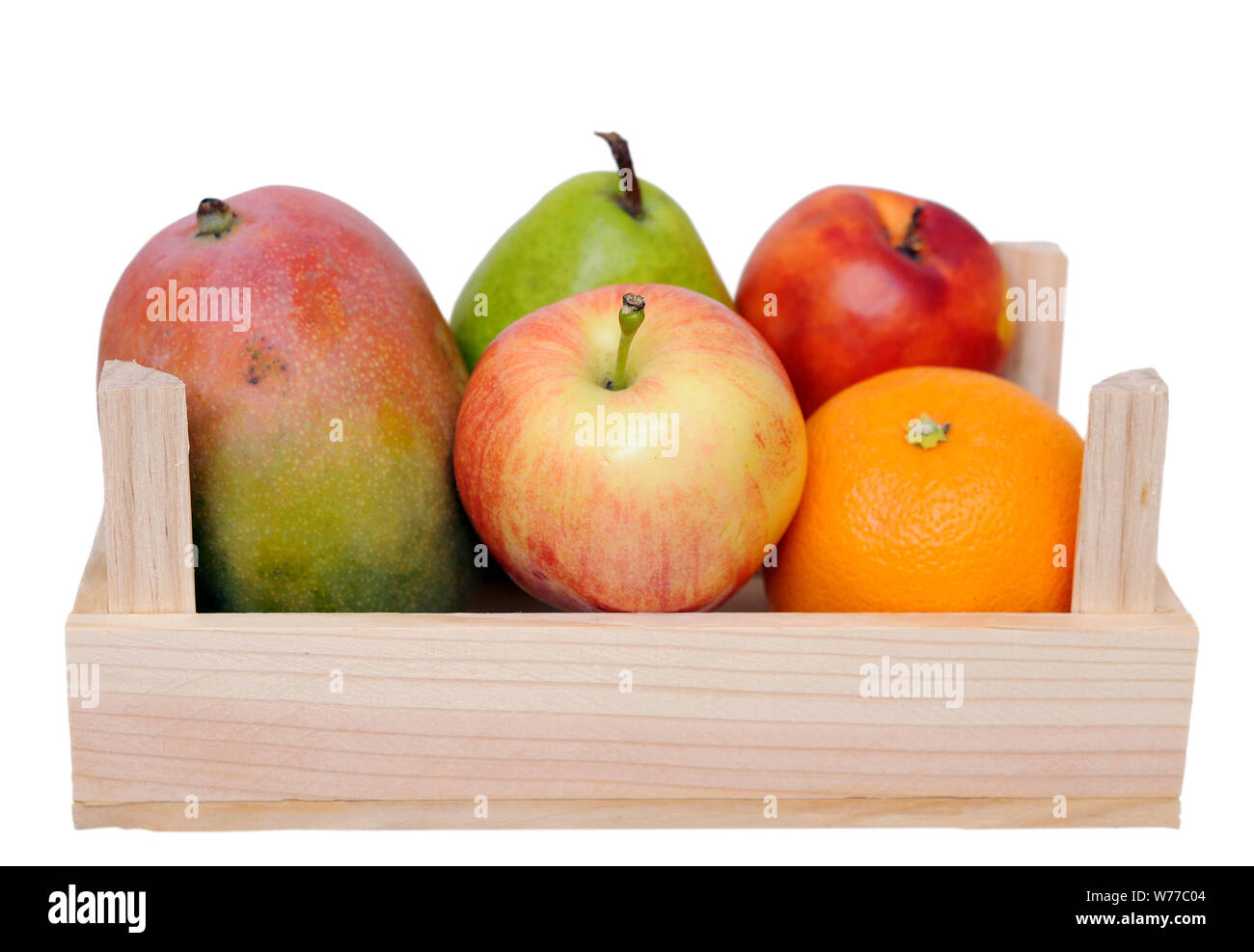 mango, apple, pear, orange, peach in crate isolated on white Stock ...