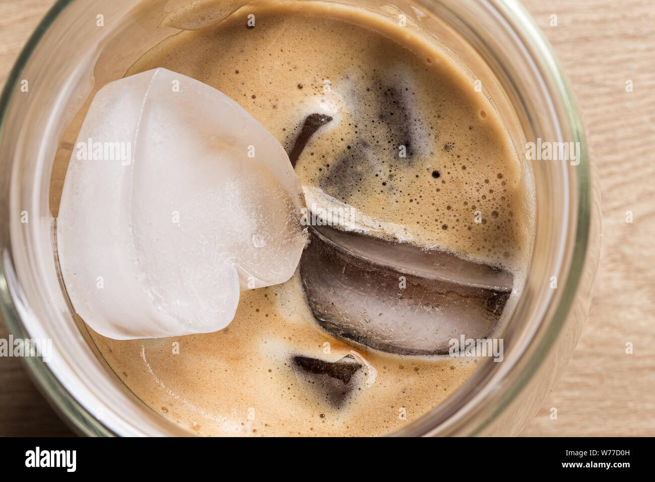 Ice coffee with heart shaped ice cubes close up Stock Photo - Alamy