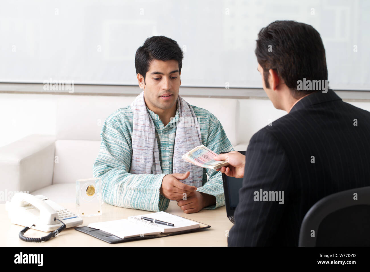 Indian bank teller hi-res stock photography and images - Alamy