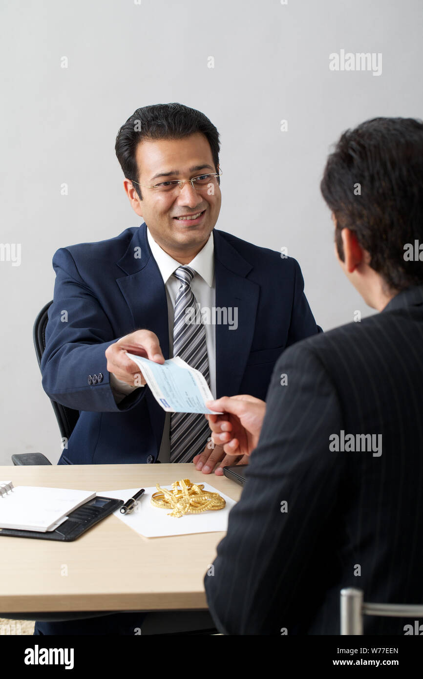 Man looking cheque hi-res stock photography and images - Alamy