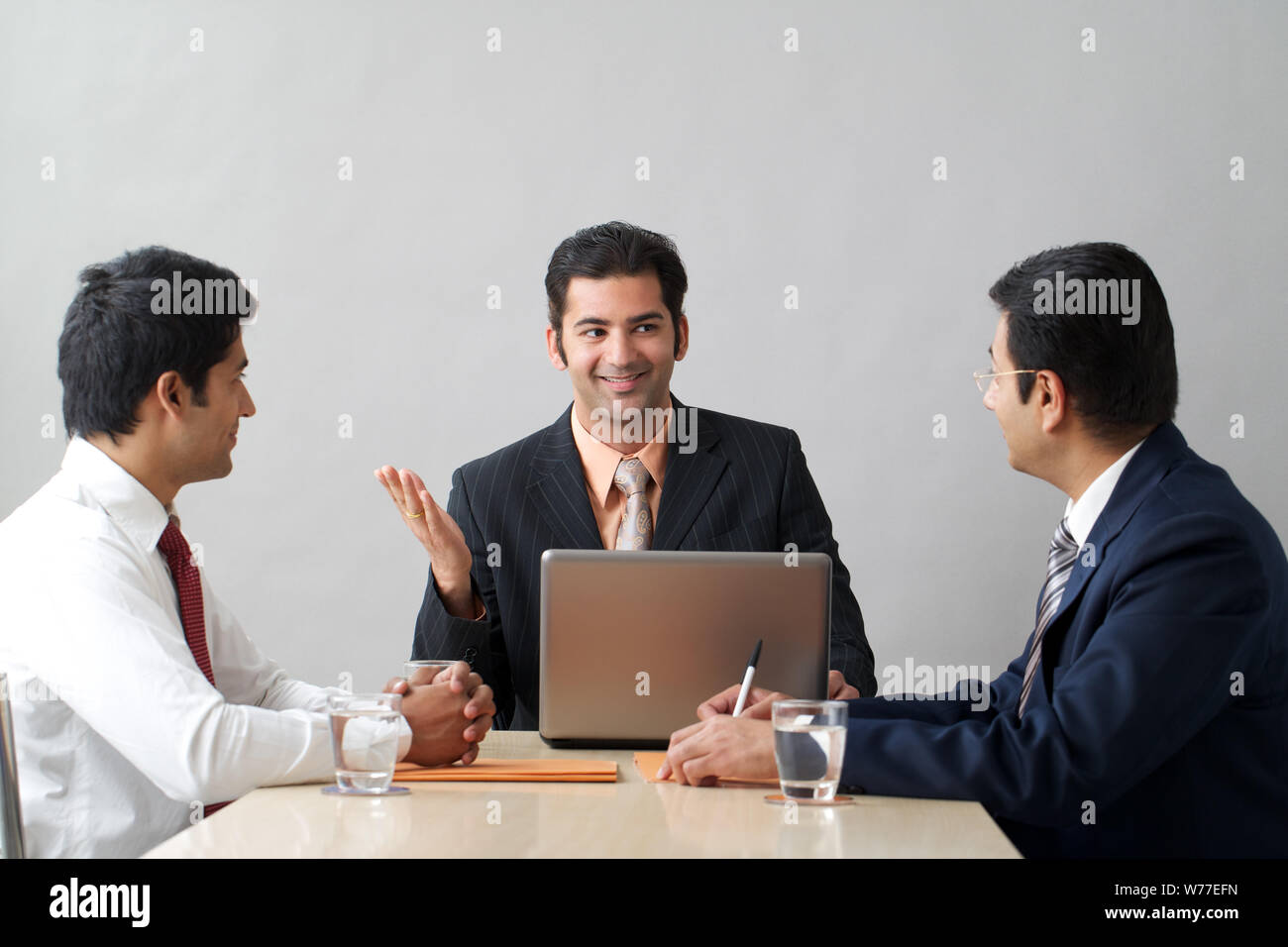 Business executives in an office meeting Stock Photo - Alamy