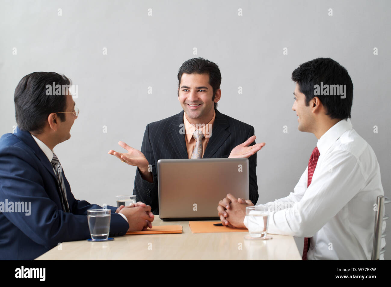 Business executives in an office meeting Stock Photo - Alamy