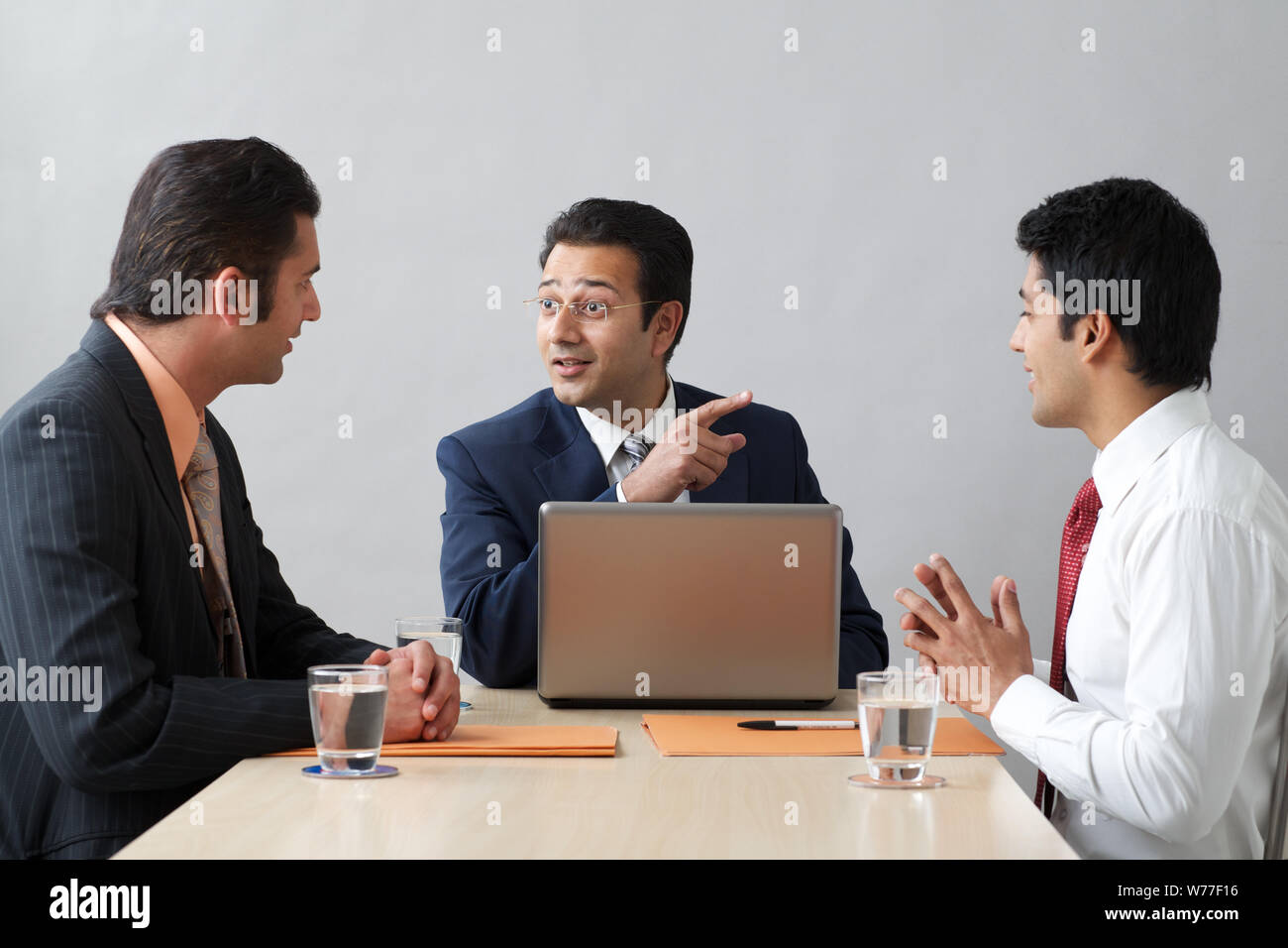 Business executives in an office meeting Stock Photo - Alamy