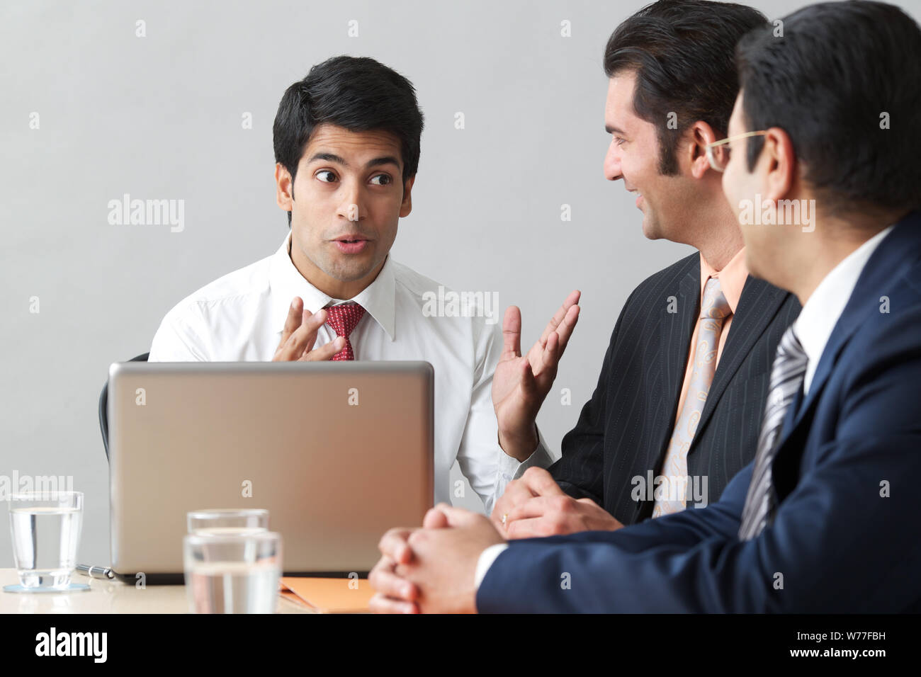 Business executives in an office meeting Stock Photo - Alamy