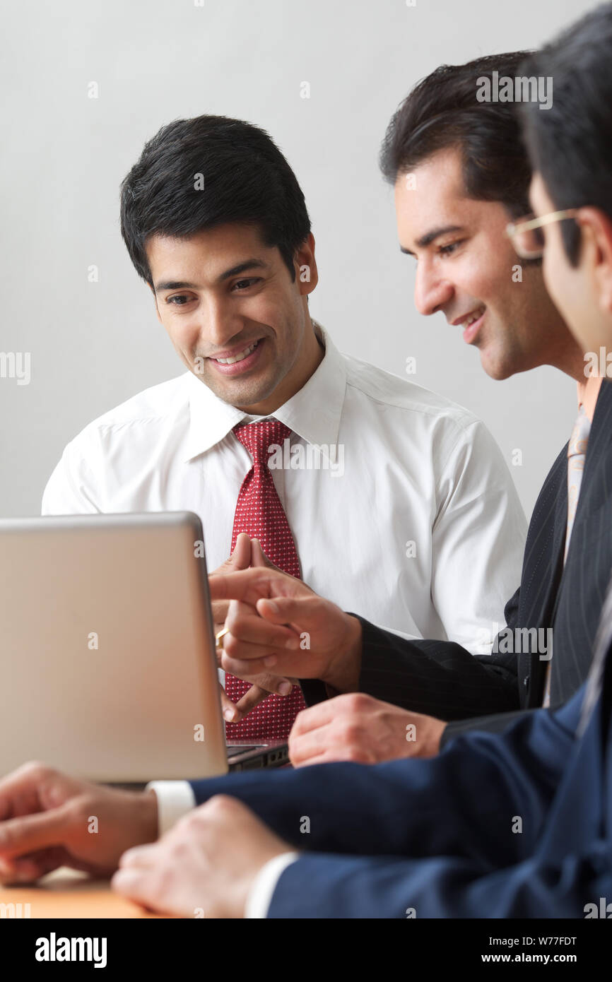 Business executives in an office meeting Stock Photo - Alamy