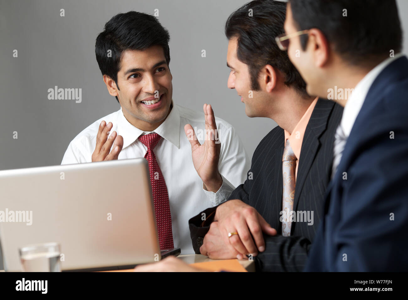 Business executives in an office meeting Stock Photo - Alamy
