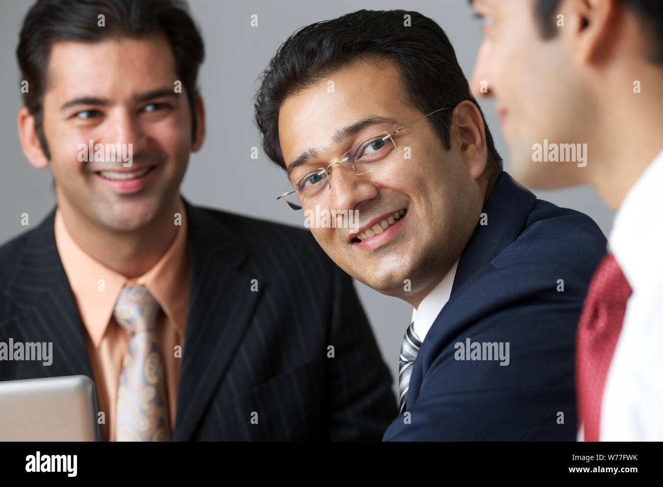 Business executives in an office meeting Stock Photo - Alamy