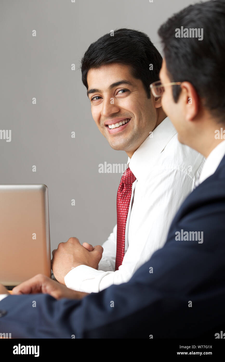 Two executives discussing hi-res stock photography and images - Alamy