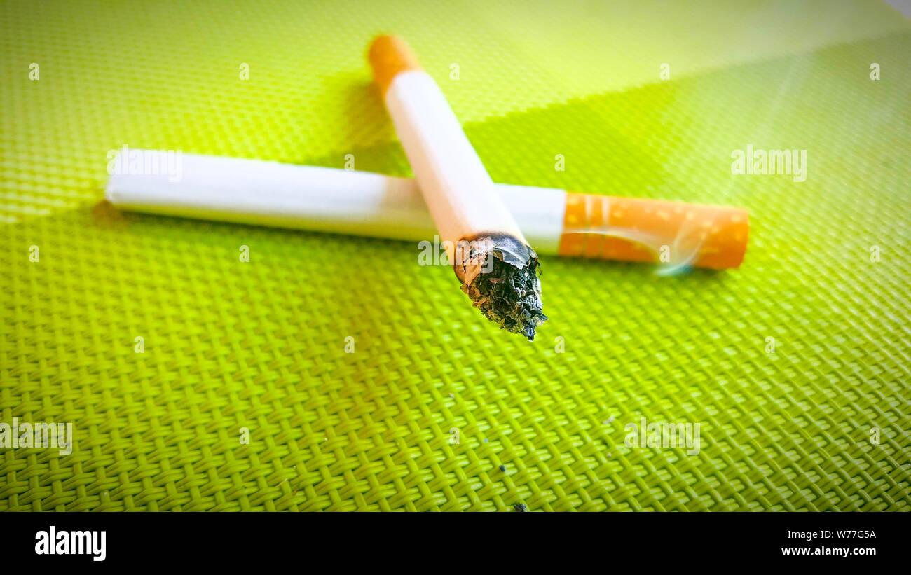 Cigarettes close-up. Harm of smoking. Tobacco use. Bad habit. Tobacco ...