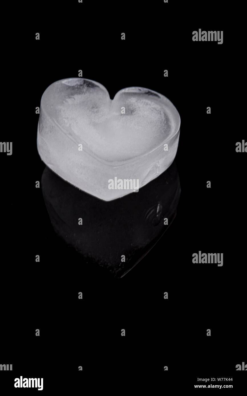 Black heart on ice hi-res stock photography and images - Alamy