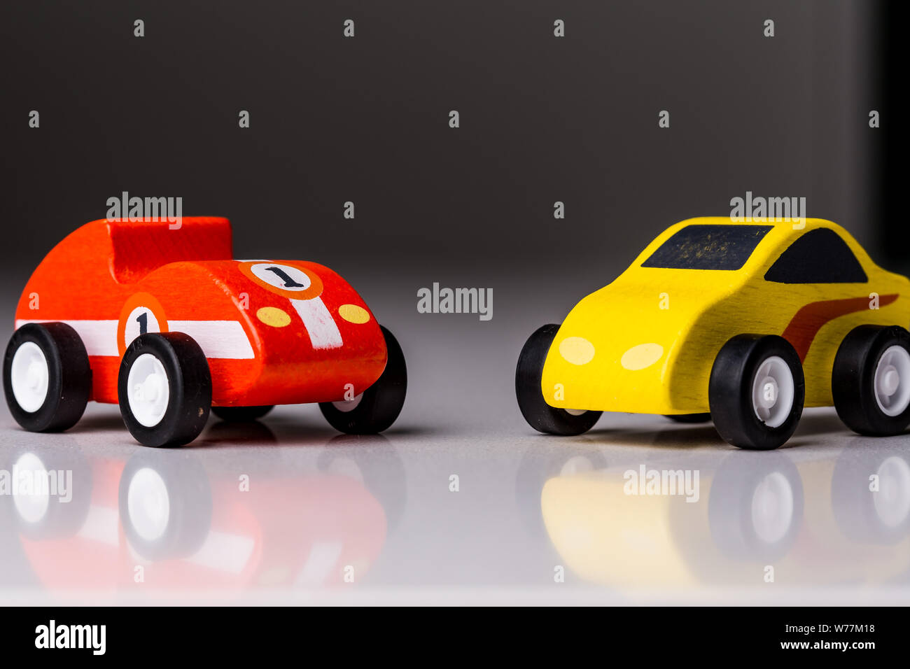 Red and yellow toy car close up on a white background Stock Photo - Alamy