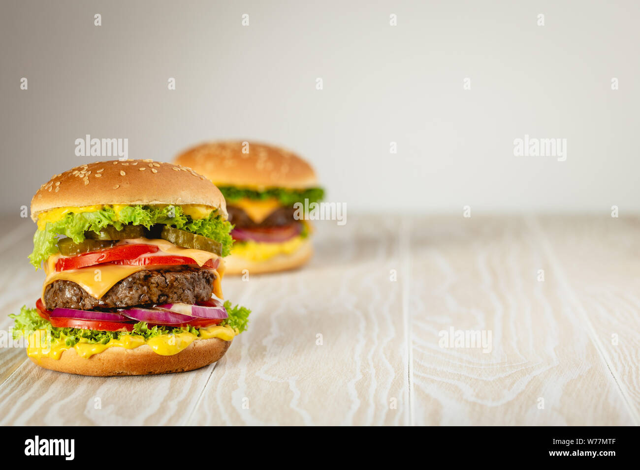 Burger dripping cheese sauce on hi-res stock photography and images - Alamy