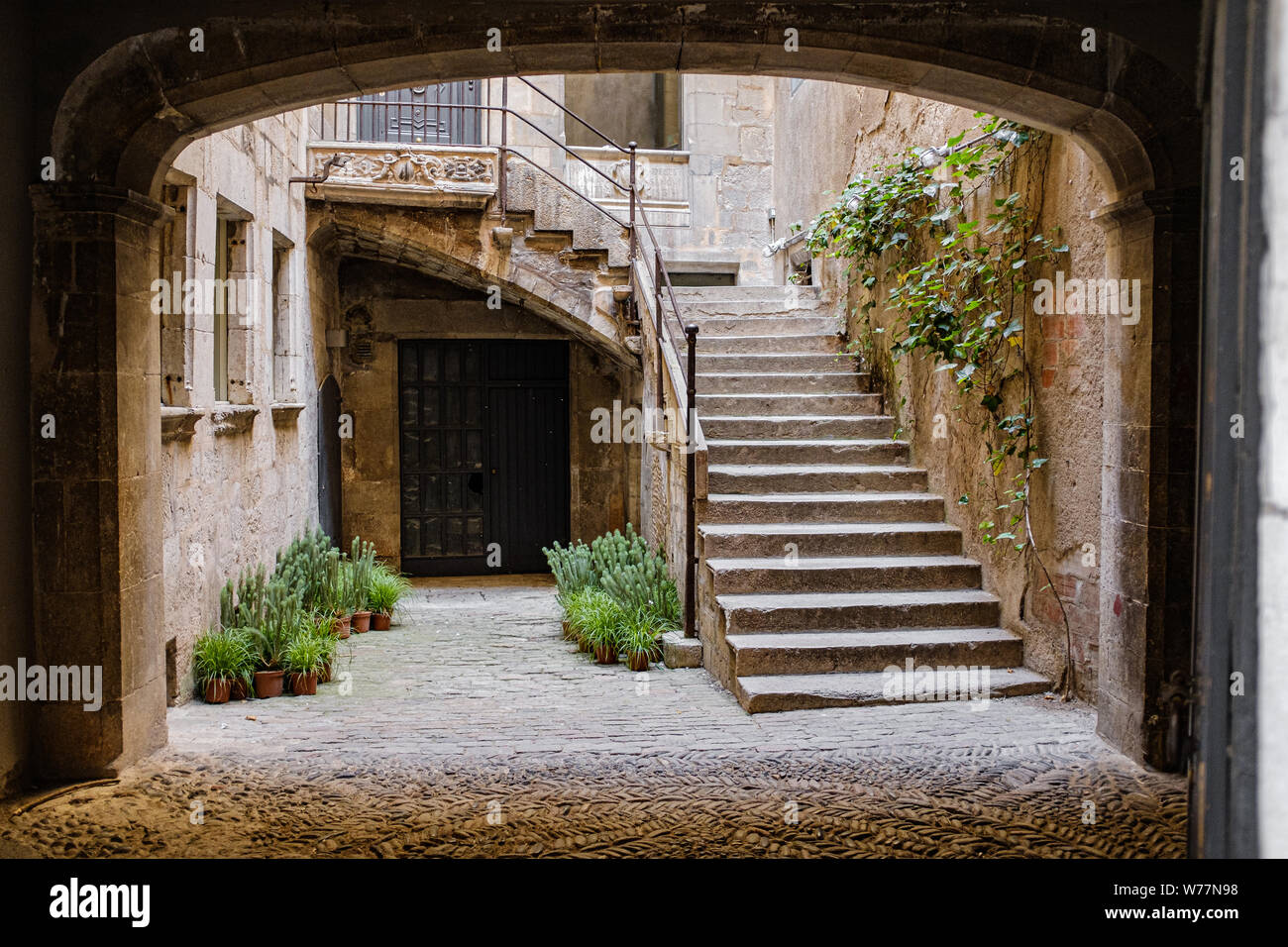 Old medieval house entrance with cobble stone stairs Stock Photo - Alamy