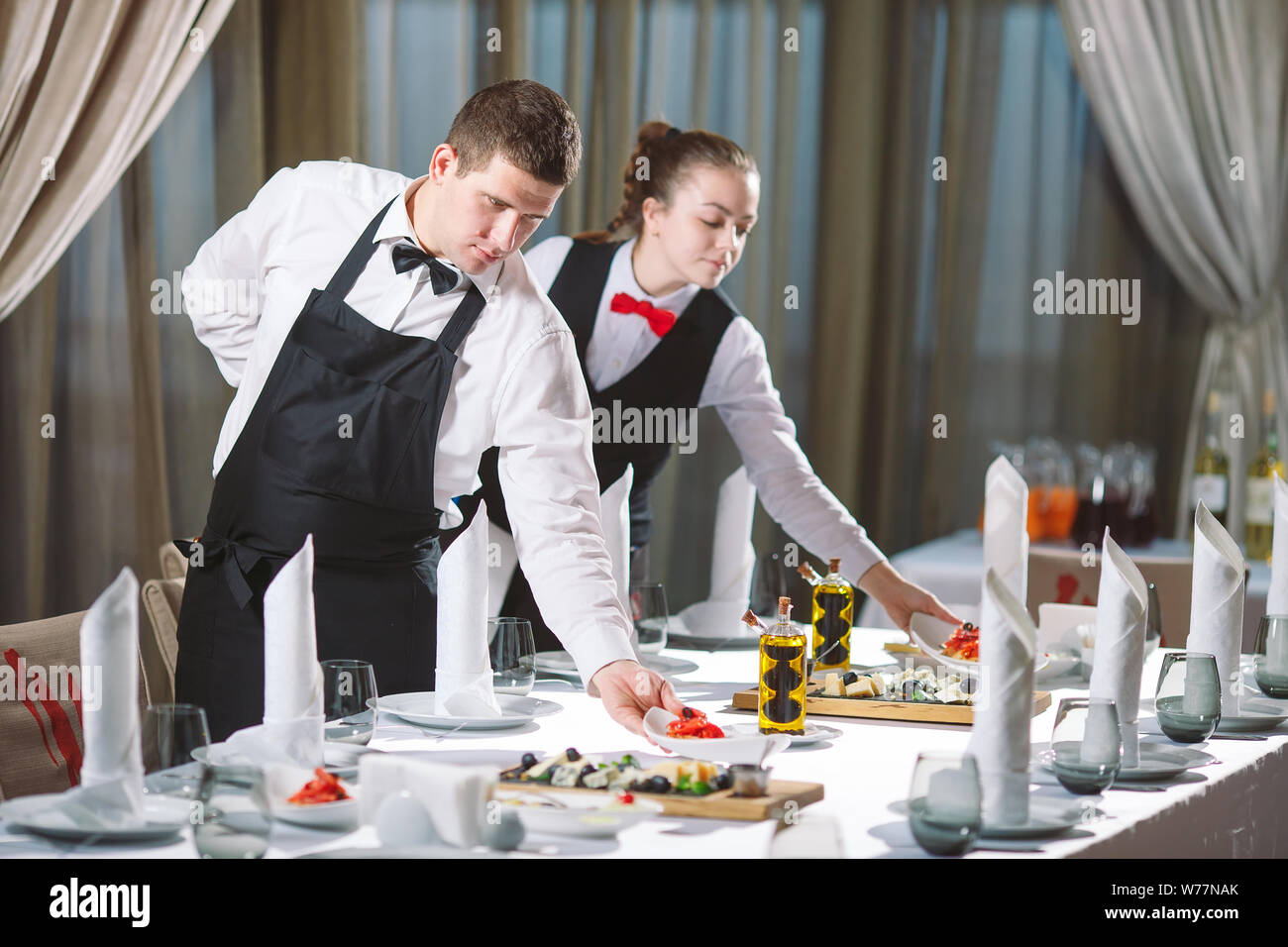 Preparing to receive serve hi-res stock photography and images - Alamy