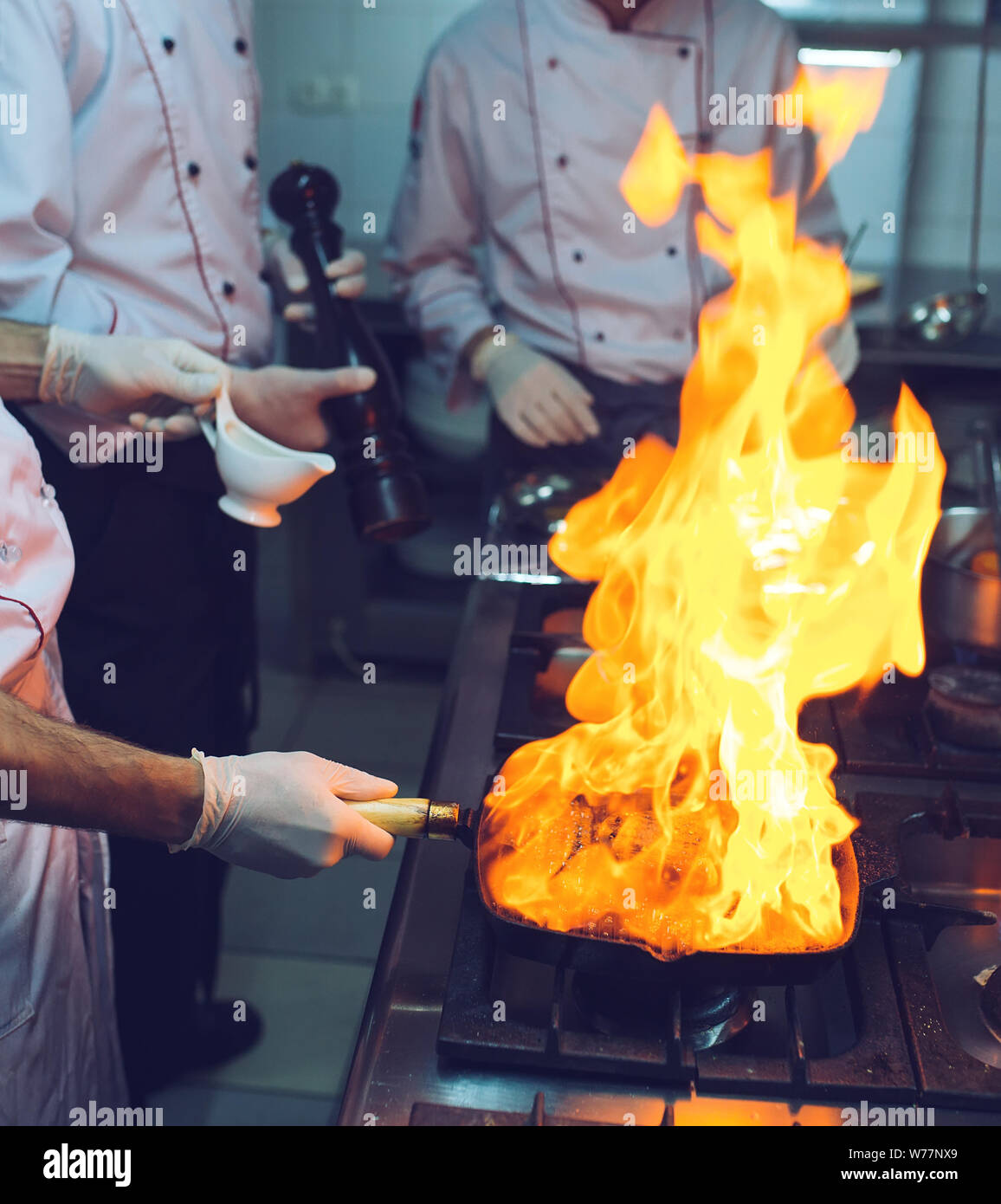 Fire in the kitchen. Fire gas burn is cooking on iron pan,stir fire ...