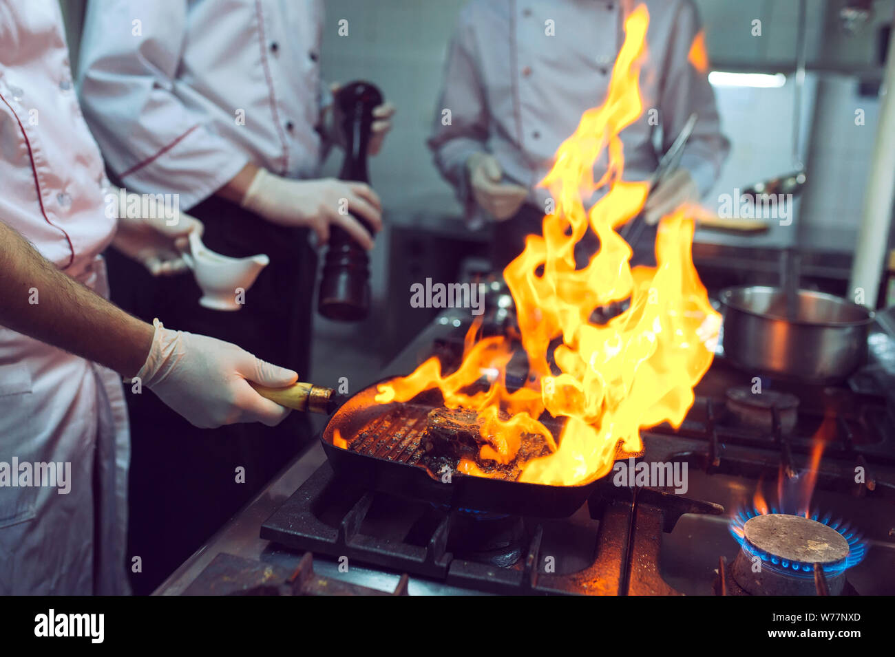 Fire in the kitchen. Fire gas burn is cooking on iron pan,stir fire ...