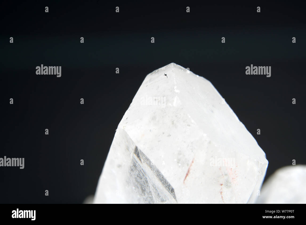 Quartz also called deep quartz with mineral inclusions in the studio in ...