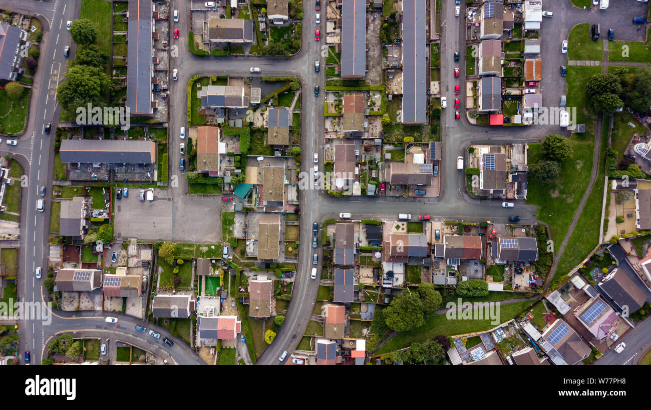 Top down aerial view of urban houses and streets in a residential area ...