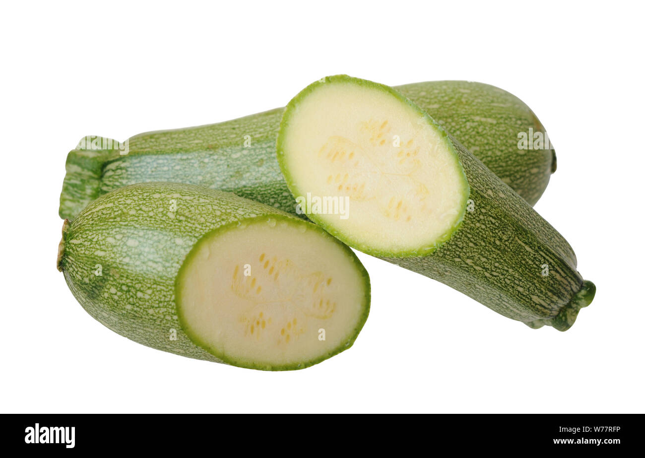 cutting and whole marrow zucchini isolated on white background Stock ...