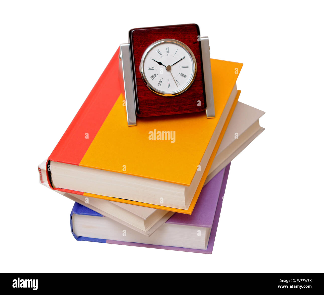 three colorful books and clock isolate on white background Stock Photo ...