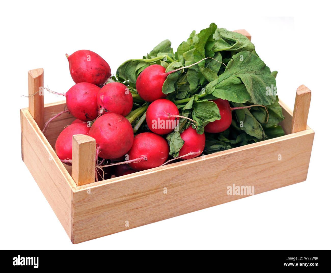 radish bunch in wooden crate isolated on white Stock Photo - Alamy