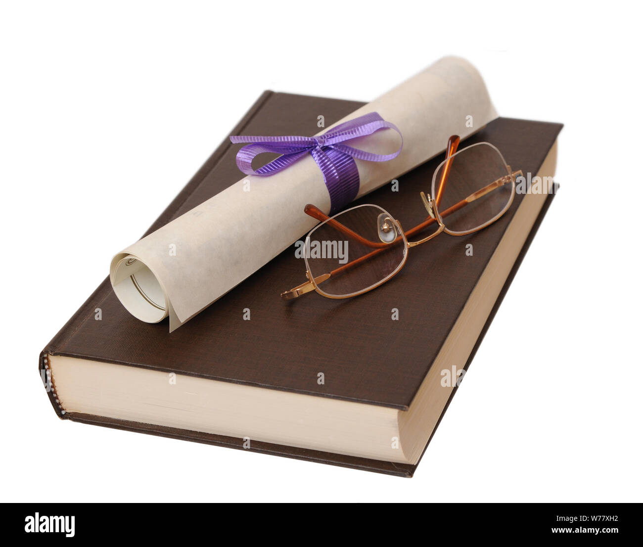 book and diploma for academy success Stock Photo - Alamy