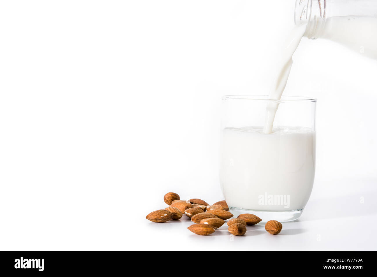 Almond milk isolated on white background. Copyspace Stock Photo - Alamy