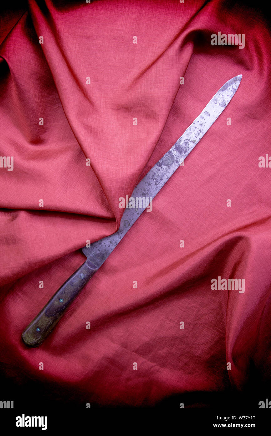 Long Knife on Fabric Stock Photo - Alamy
