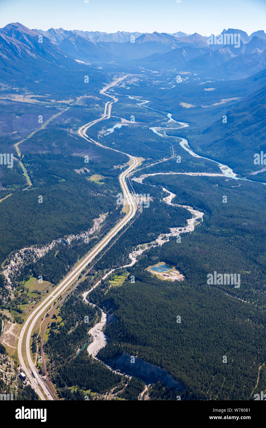 Aerial view of the Trans Canada Highway between Banff and Canmore in Banff National Park ...