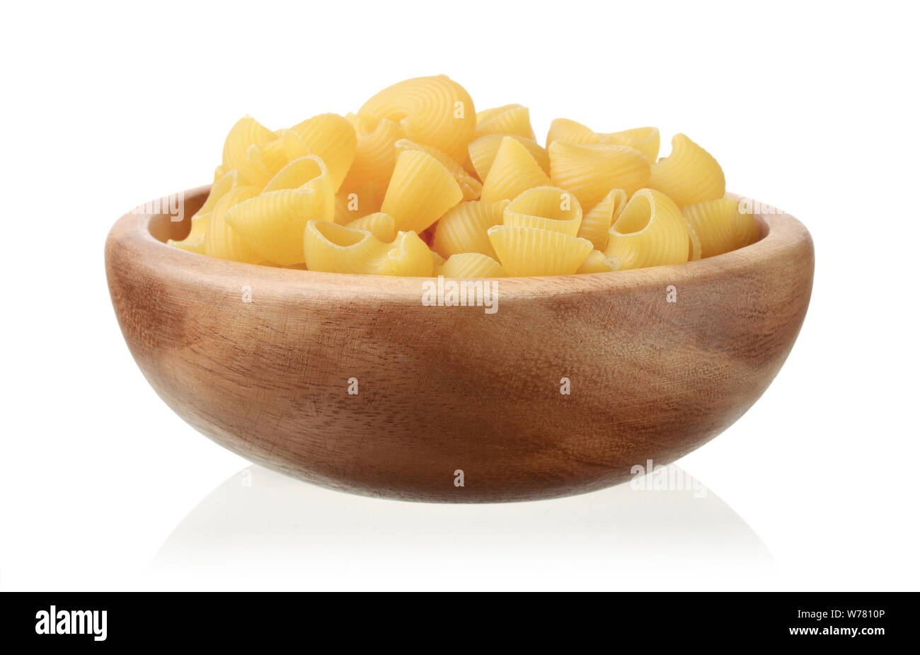 Pasta raw on wooden Cut Out Stock Images & Pictures - Alamy