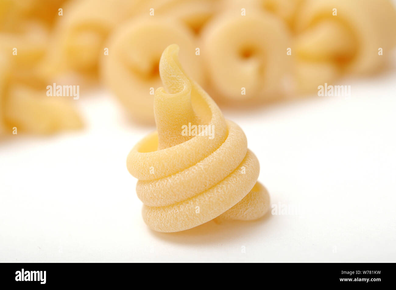 sconcigli seashell pasta shape on white Stock Photo - Alamy