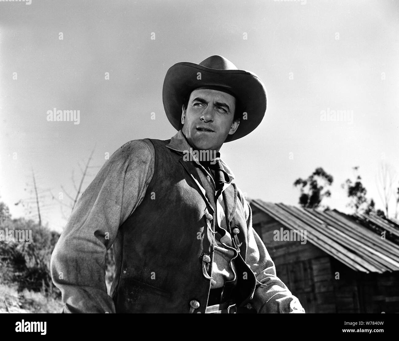 Man With Gun And Hat High Resolution Stock Photography and Images - Alamy